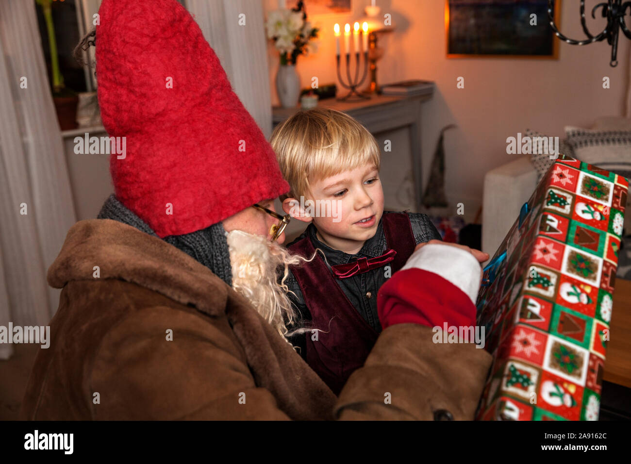 Boy meeting Santa Stock Photo - Alamy