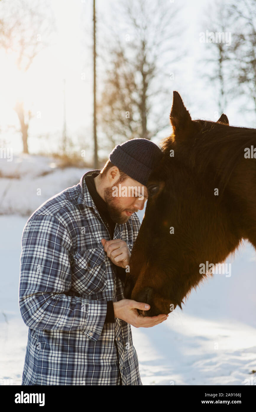 Man with horse Stock Photo - Alamy