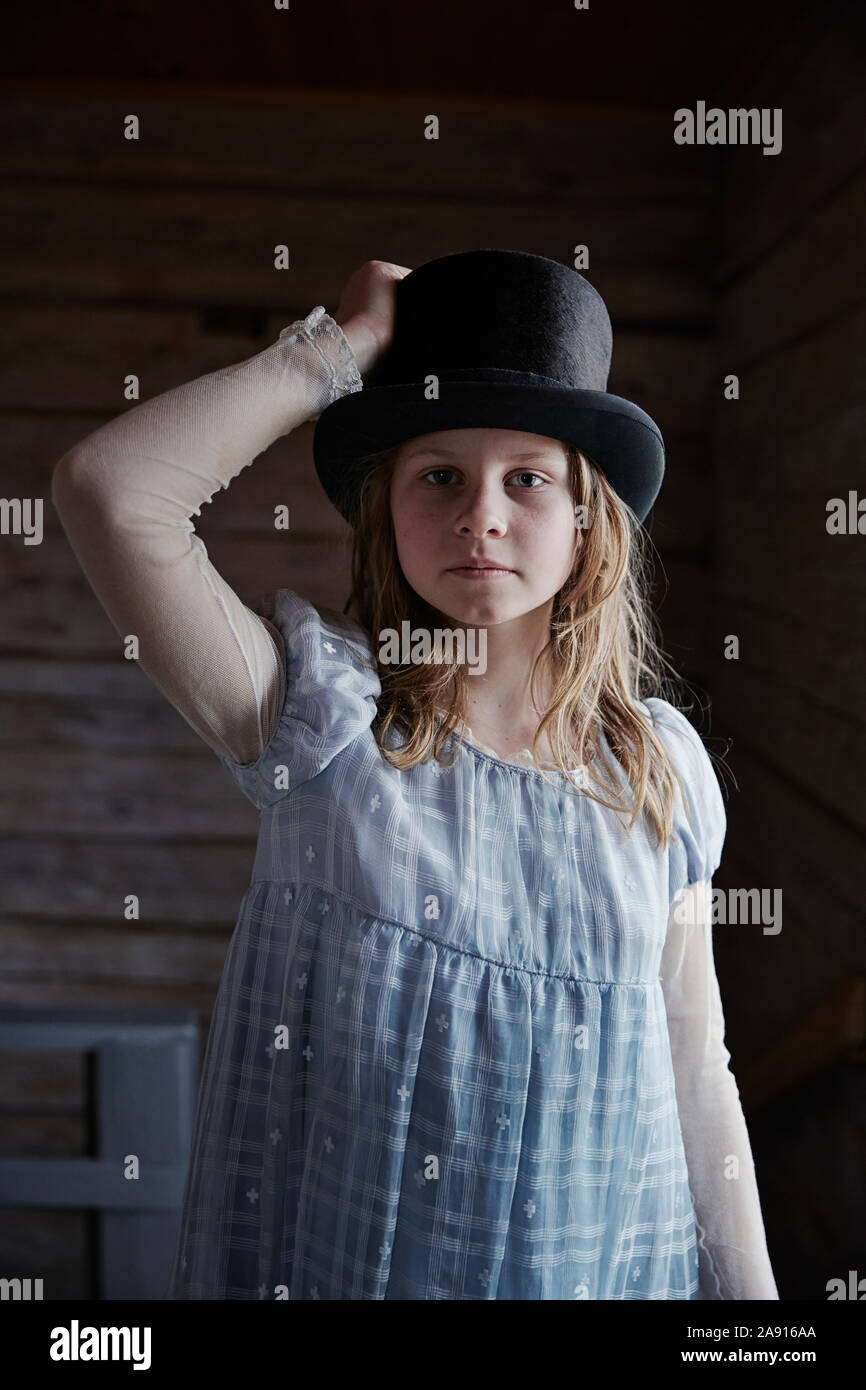 Girl wearing top hat Stock Photo - Alamy