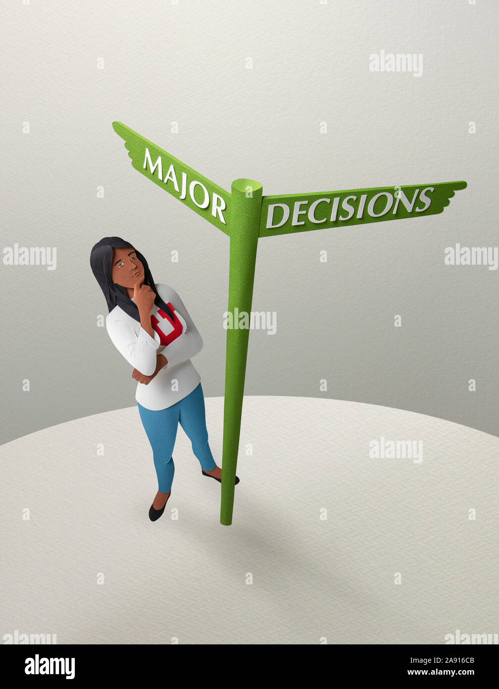 Student looking up at decision signpost Stock Photo - Alamy