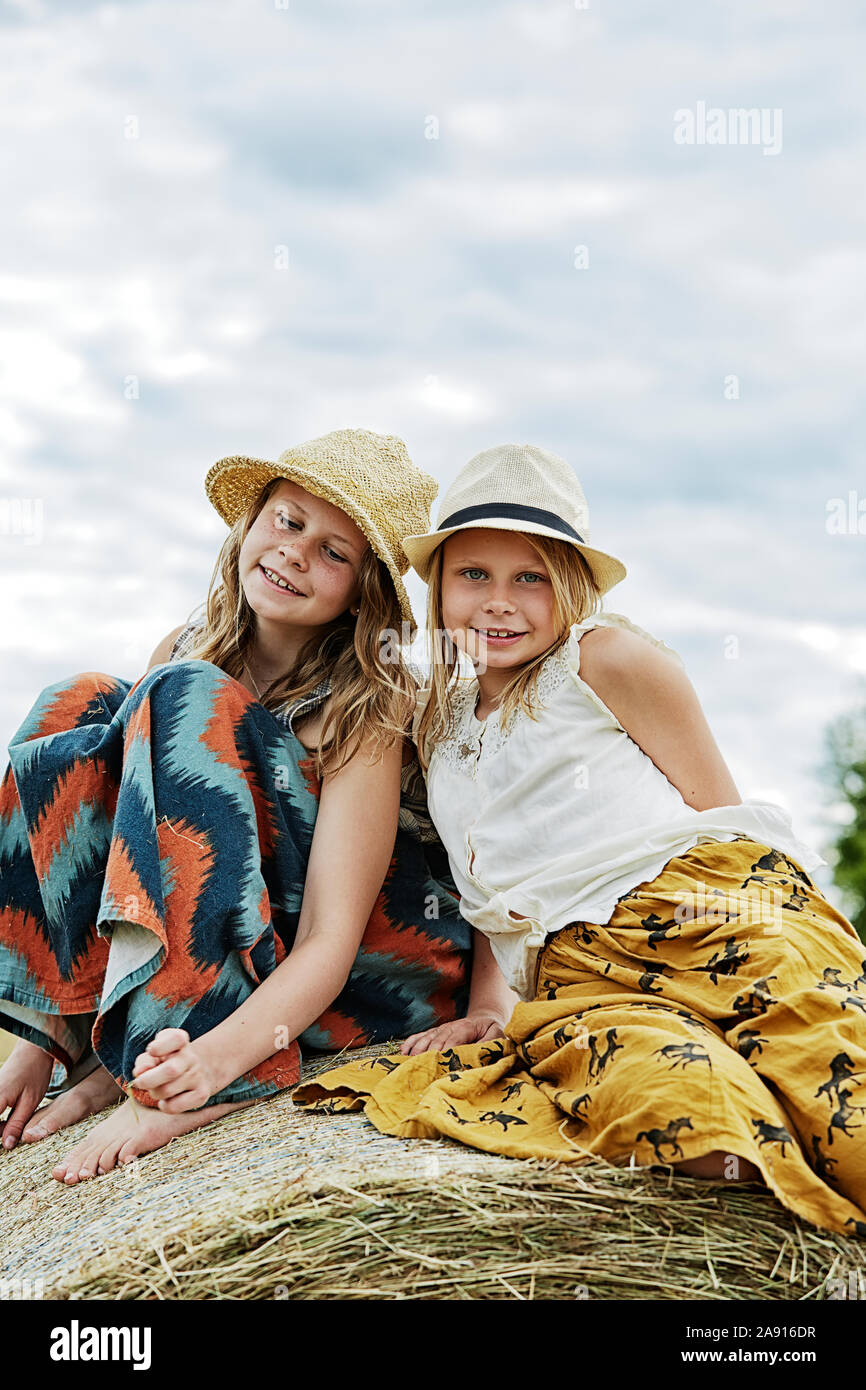 Smiling sisters together Stock Photo - Alamy