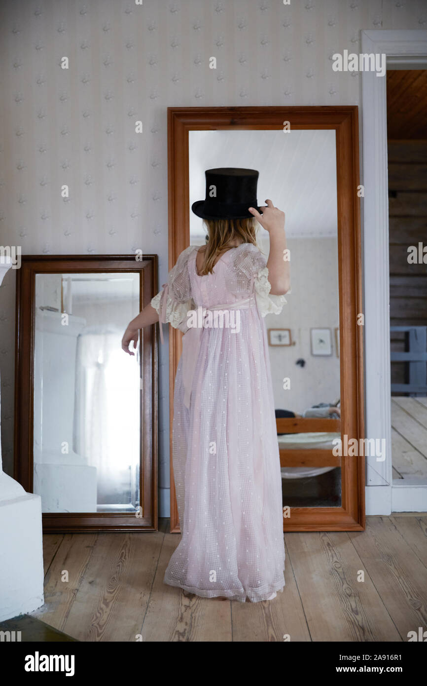 Girl wearing top hat Stock Photo - Alamy