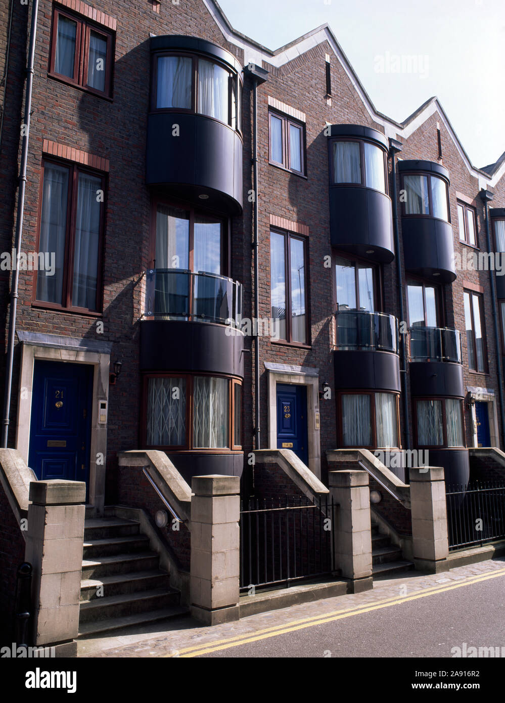 New build terrace of town houses in London Stock Photo - Alamy