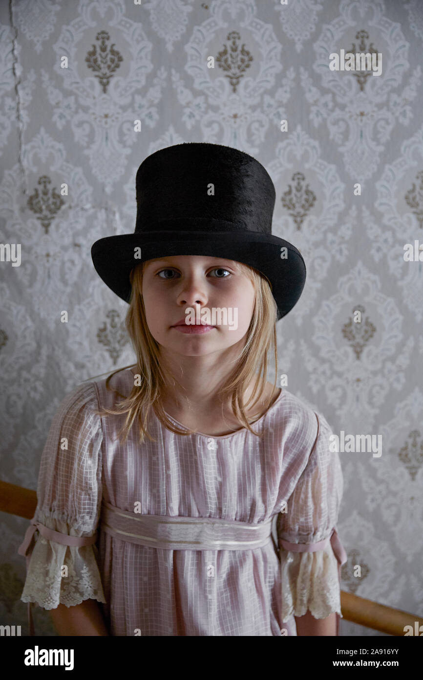 Girl wearing top hat Stock Photo - Alamy