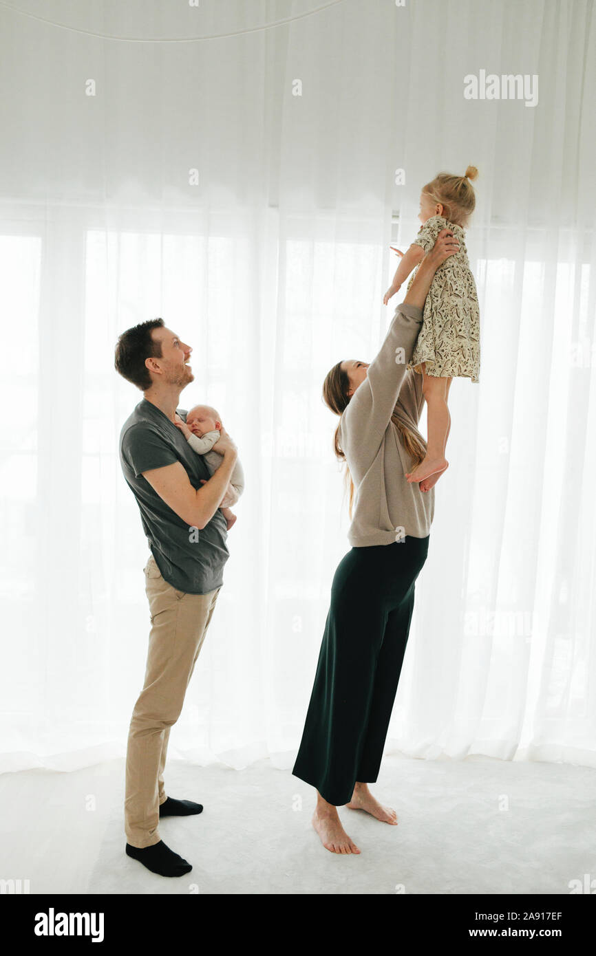 Parents with two children Stock Photo - Alamy