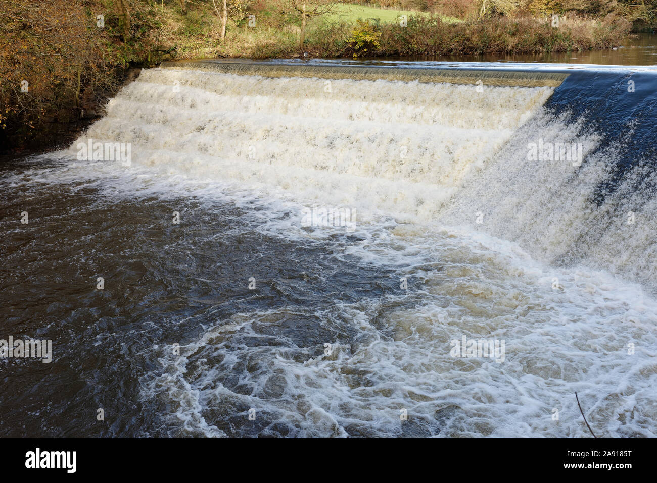 Weir on river Irwell after heavy rainfall in burrs country park bury ...