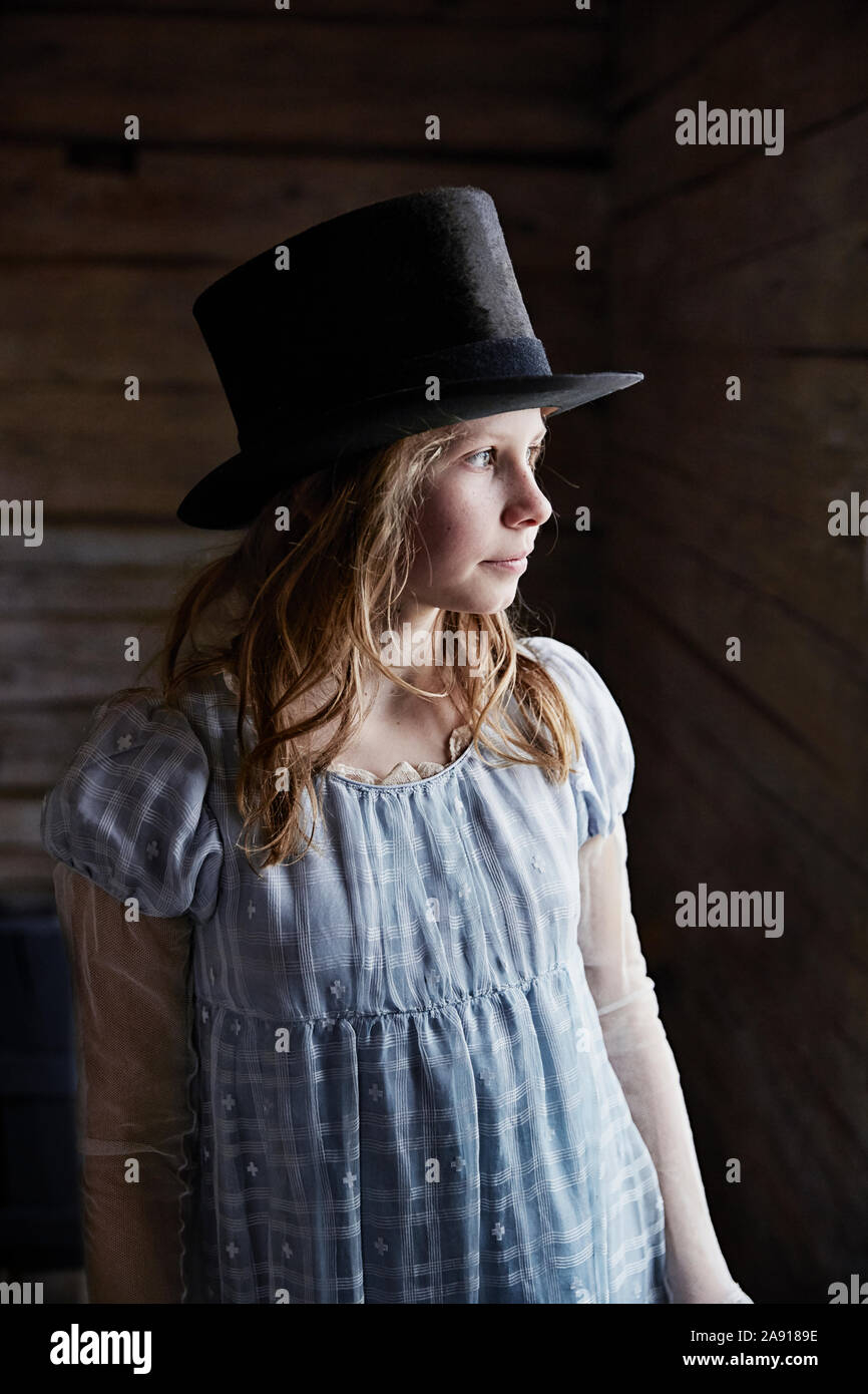 Girl wearing top hat Stock Photo - Alamy