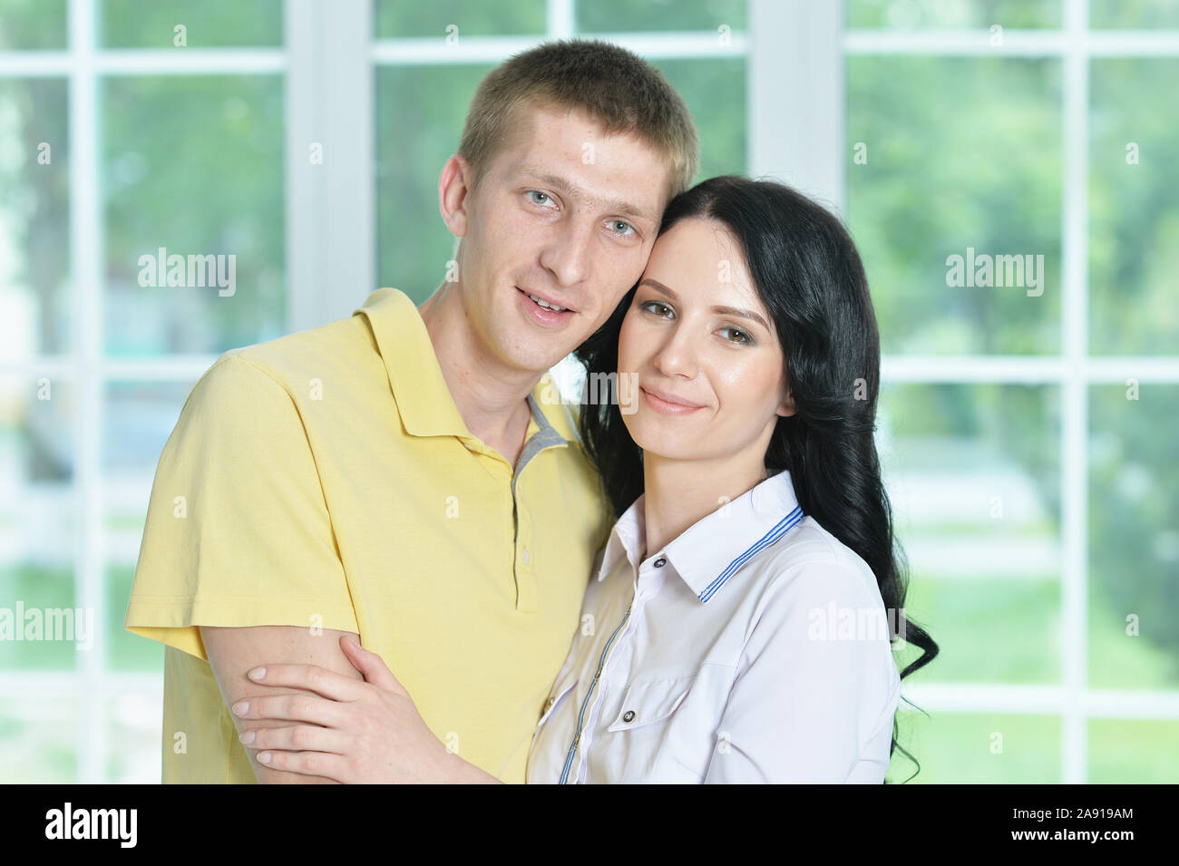 Close up portrait of pretty couple posing Stock Photo - Alamy
