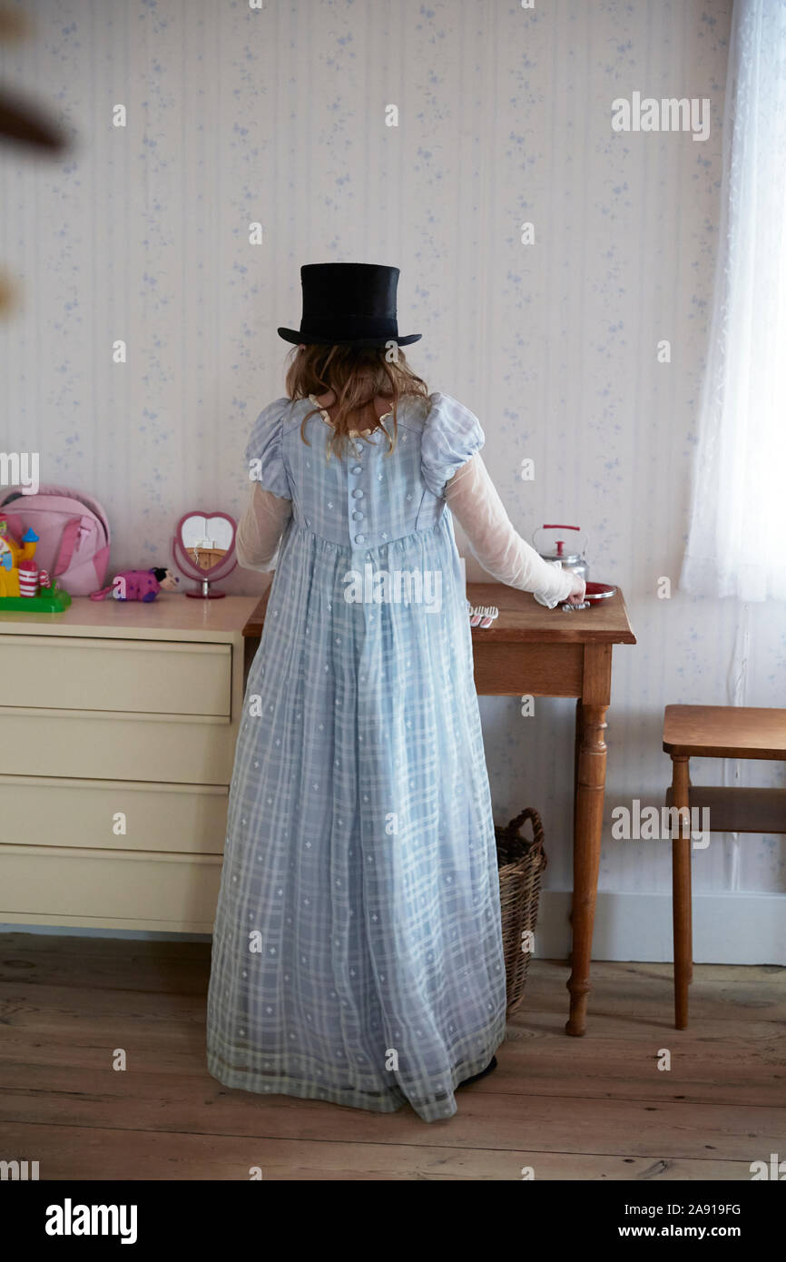 Girl wearing top hat Stock Photo - Alamy