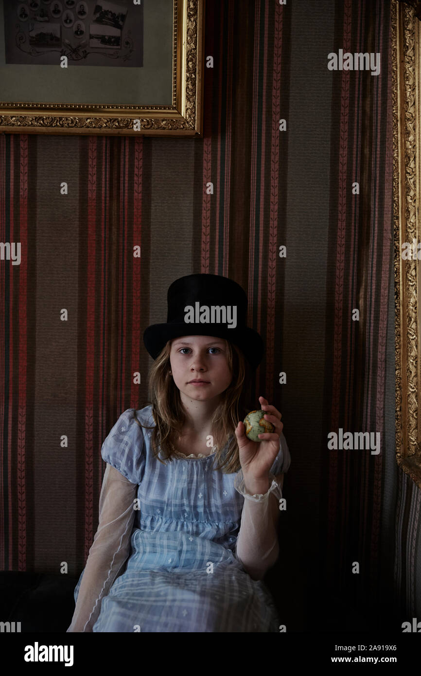 Girl wearing top hat Stock Photo - Alamy