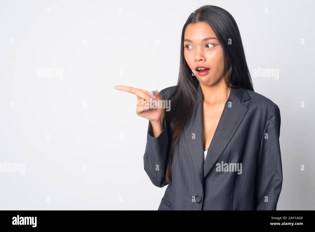 Woman pointing finger shocked hi-res stock photography and images - Alamy