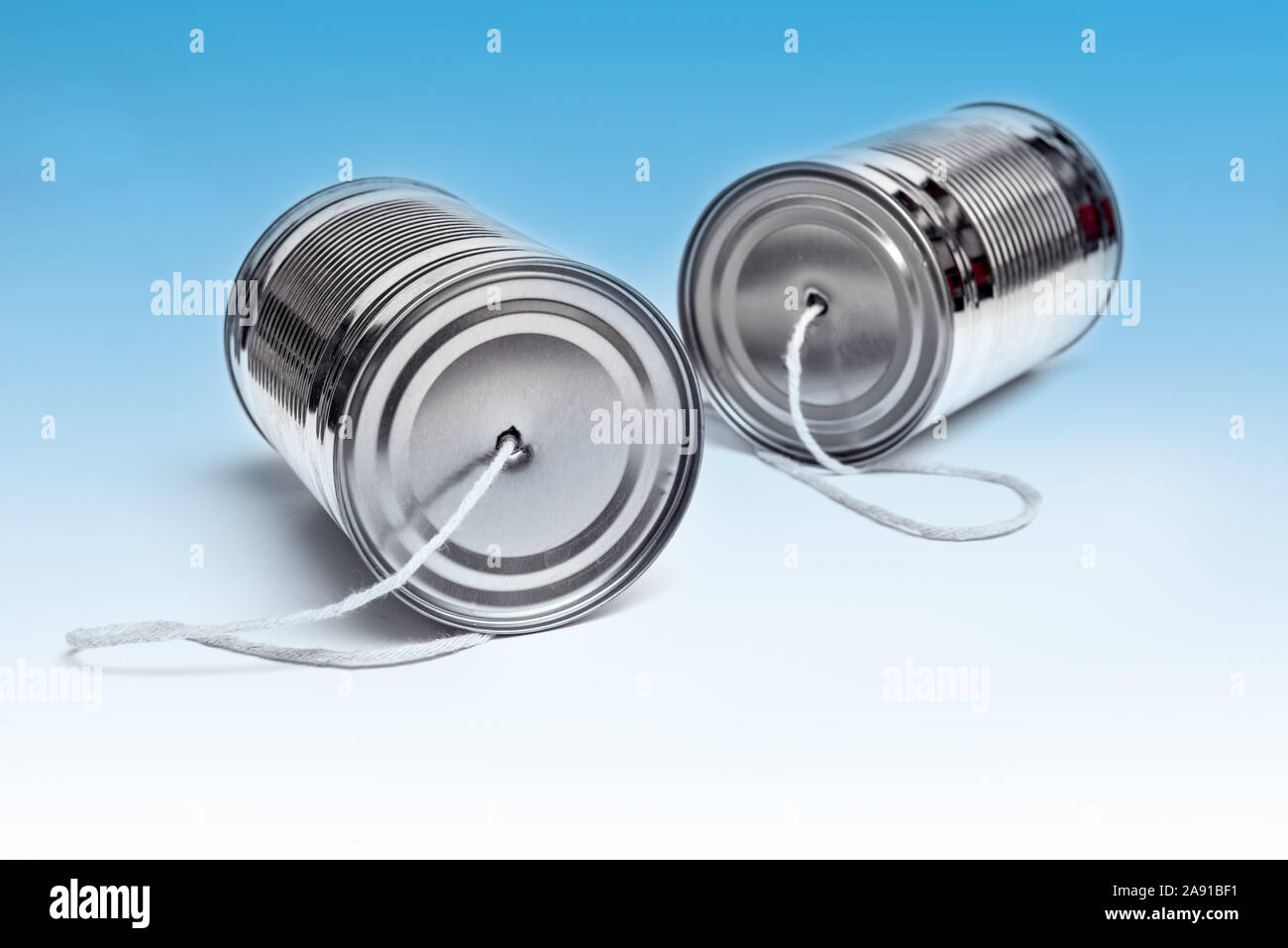 Tin can string retro hi-res stock photography and images - Alamy