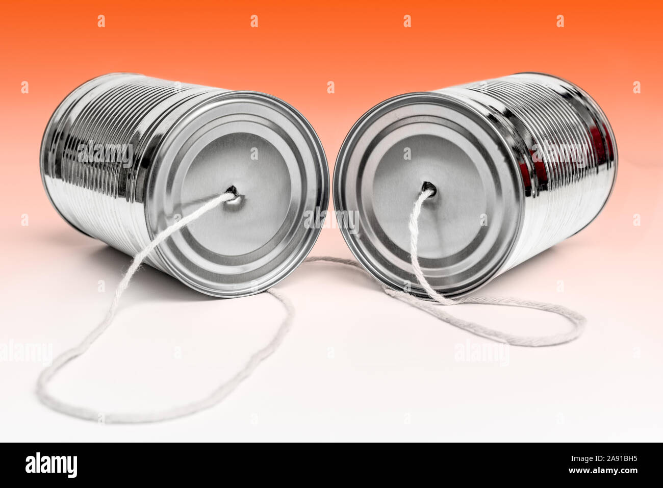 Tin can string retro hi-res stock photography and images - Alamy
