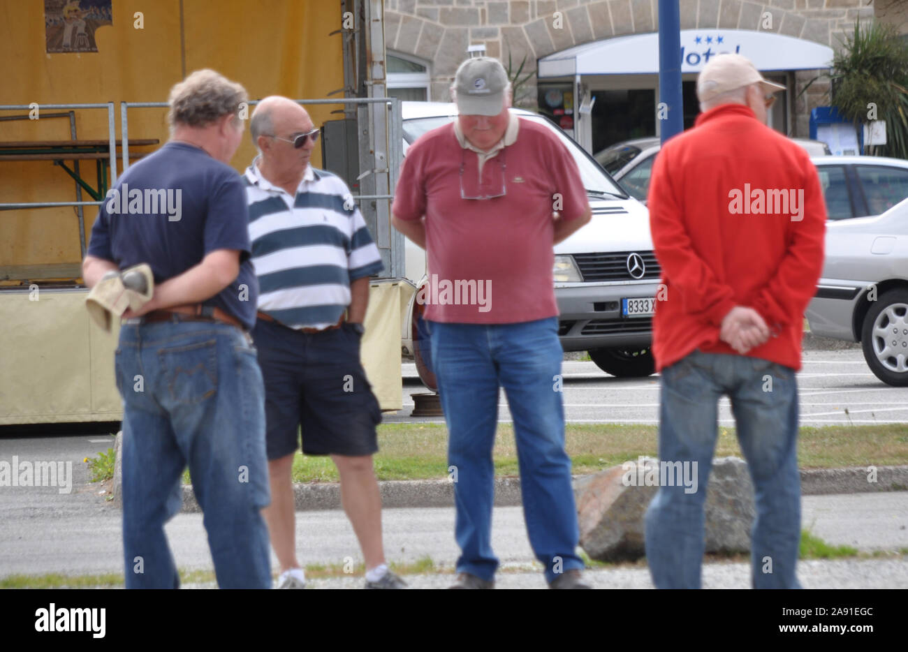French Men holding discussion on street Stock Photo - Alamy
