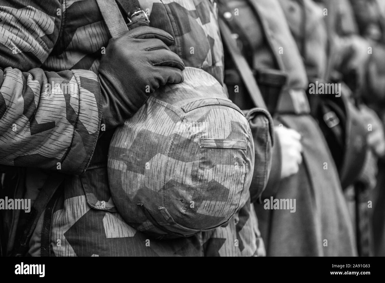 Wehrmacht soldier helmet covered in camouflage fabric. Black and white ...