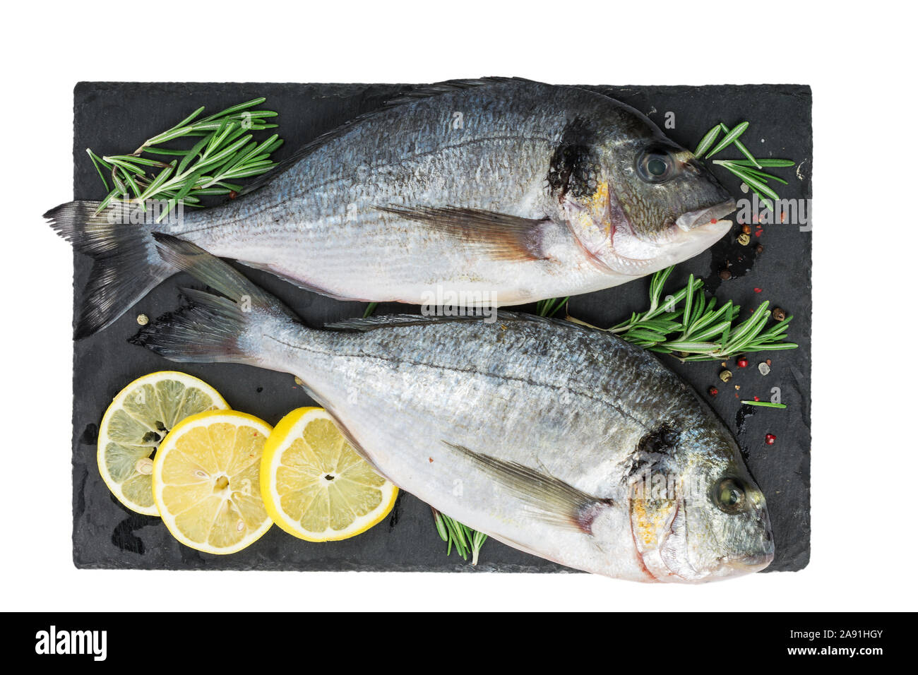 Fresh dorado on black slate hi-res stock photography and images - Alamy