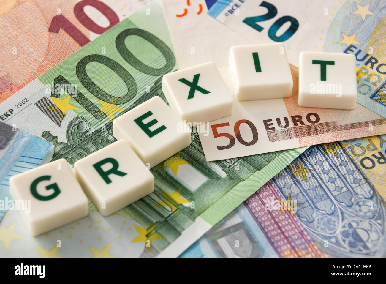 Grexit symbols and Euro background Stock Photo - Alamy