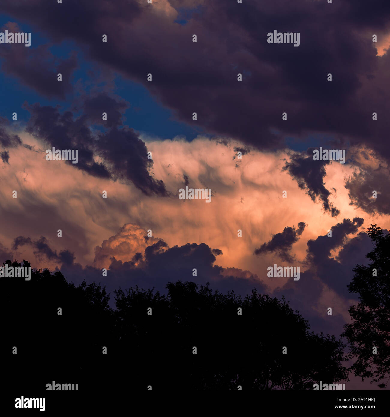 Colourful clouds during sunset Stock Photo - Alamy