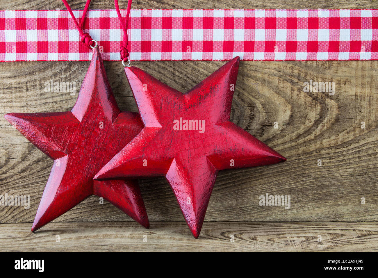 Christmas decoration with two wooden stars Stock Photo - Alamy