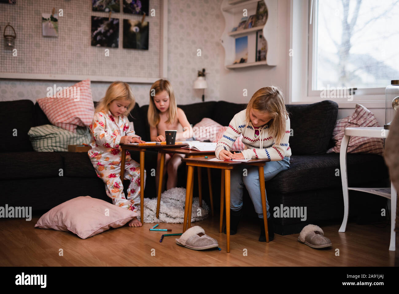 Girls drawing together Stock Photo - Alamy