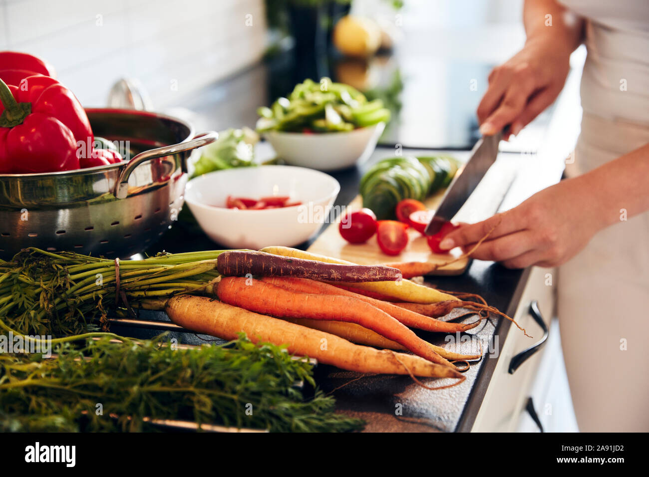 Woman preparing healthy food in kitchen Stock Photo - Alamy