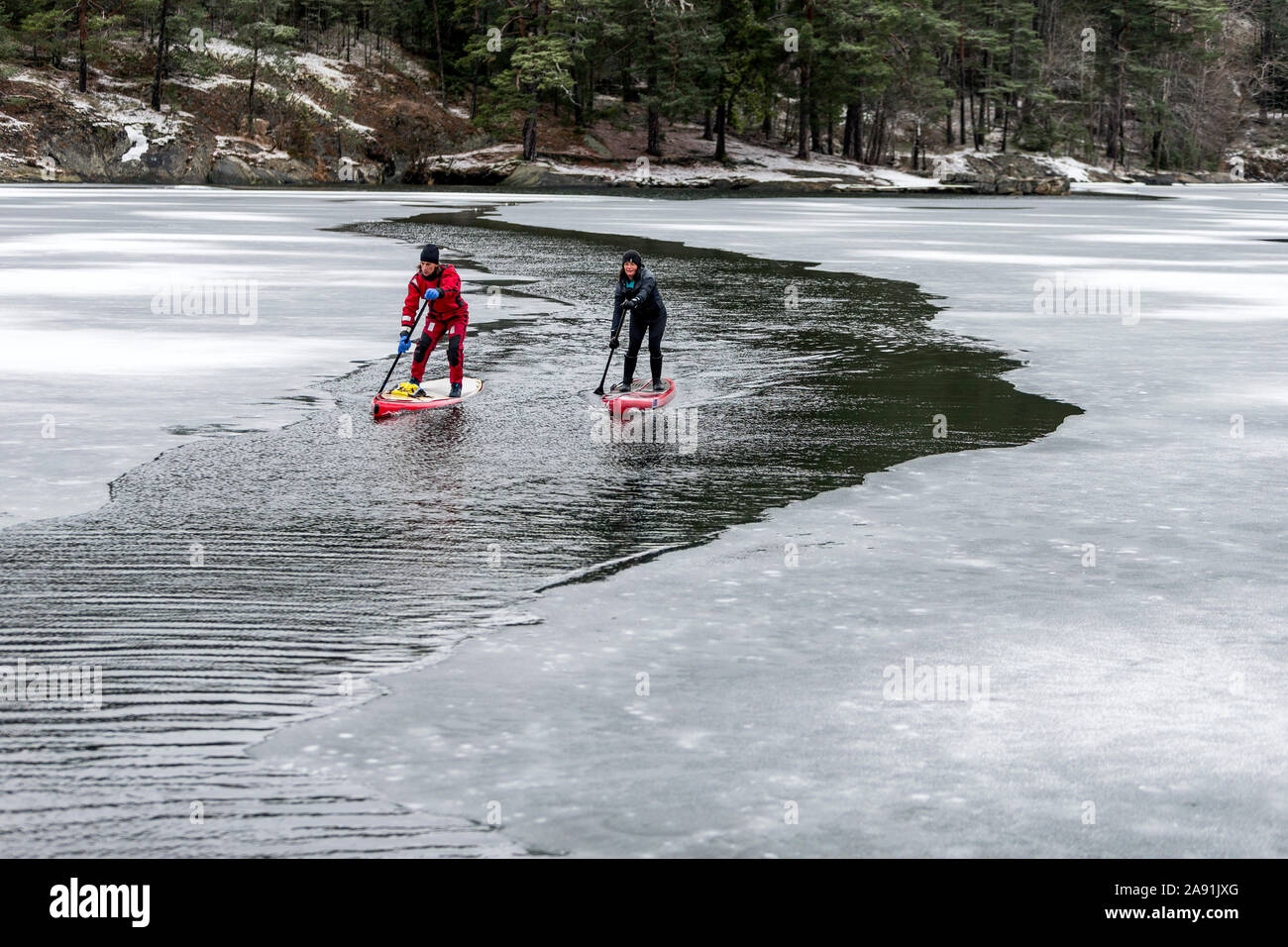 People paddle boarding Stock Photo - Alamy