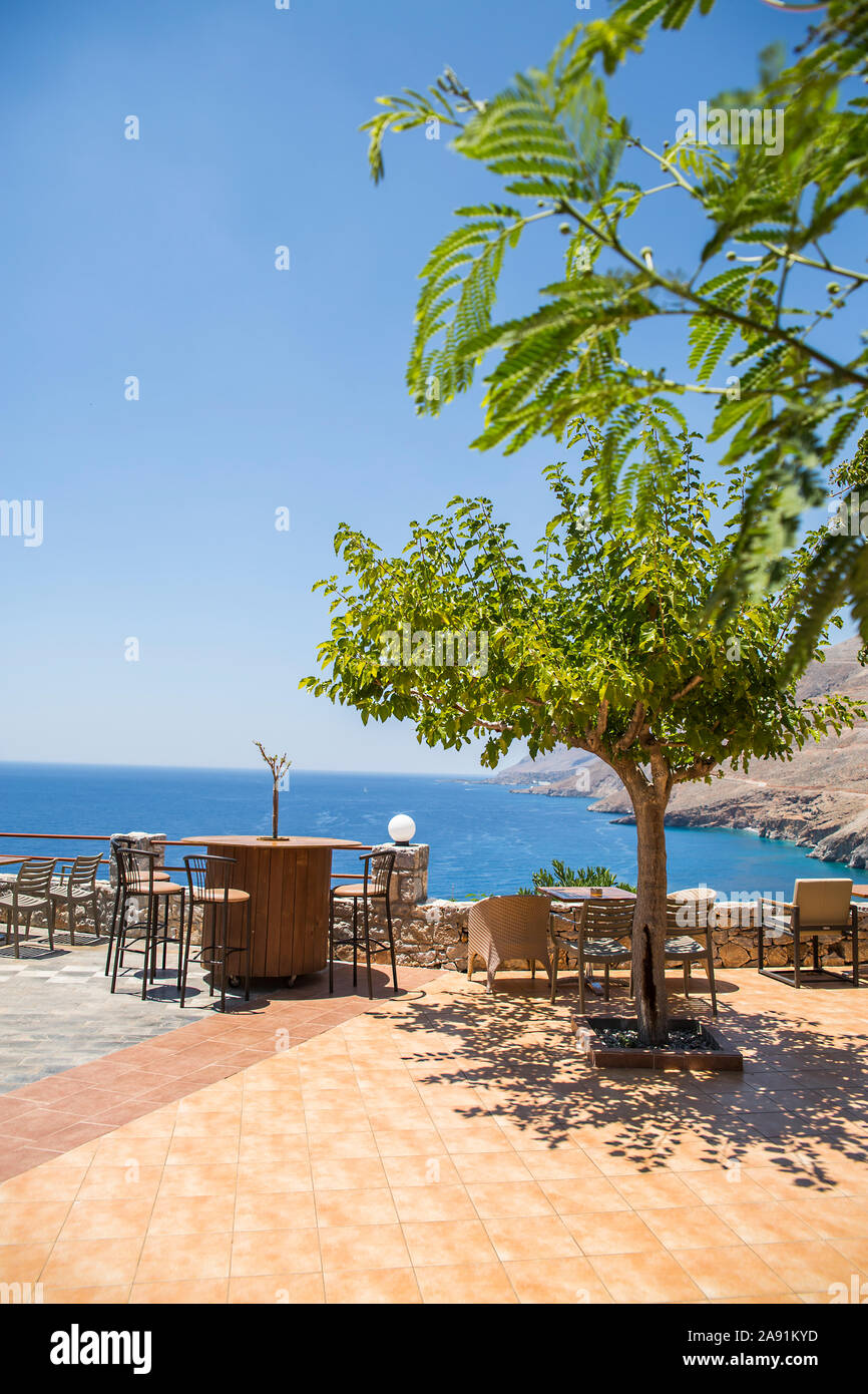 Outdoor cafe at sea Stock Photo - Alamy