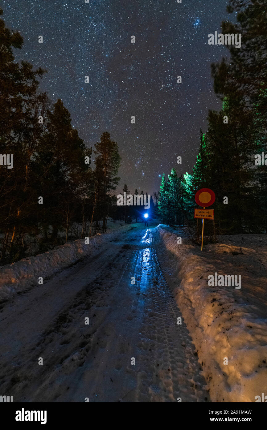 Winter road at night Stock Photo - Alamy