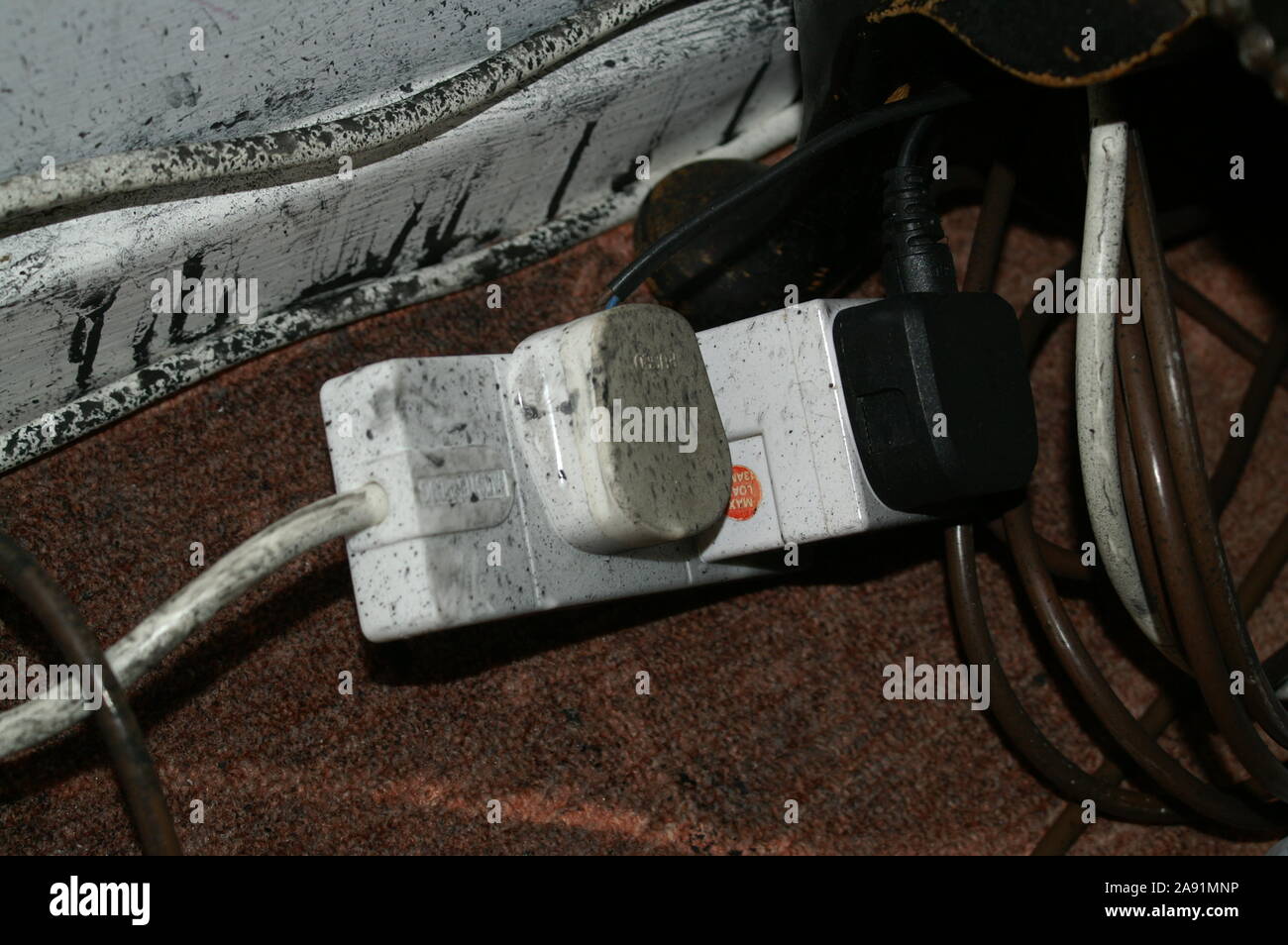 overloaded socket, house fire Stock Photo - Alamy