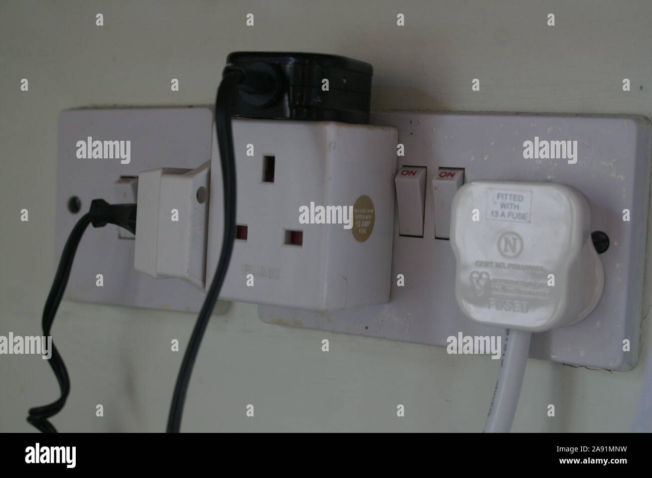 faulty electrics, electrical fire hazard Stock Photo - Alamy