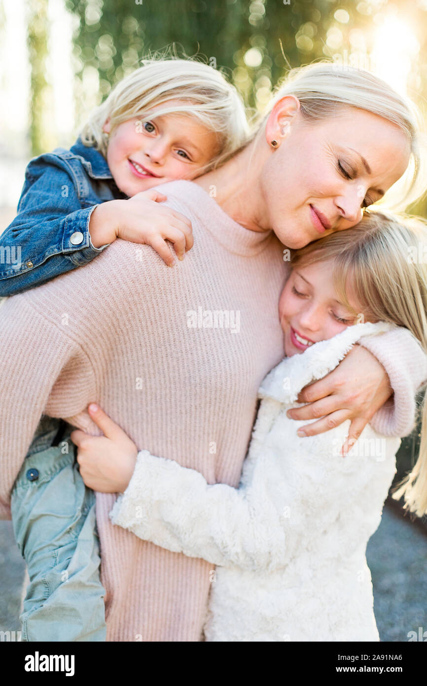 Mother with kids Stock Photo - Alamy