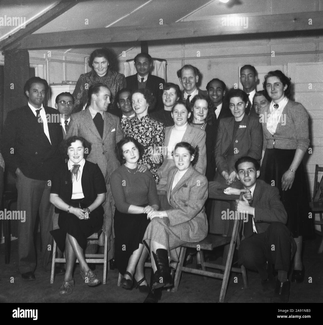 1950s, historical, post-ww2, a group of people from different parts of ...