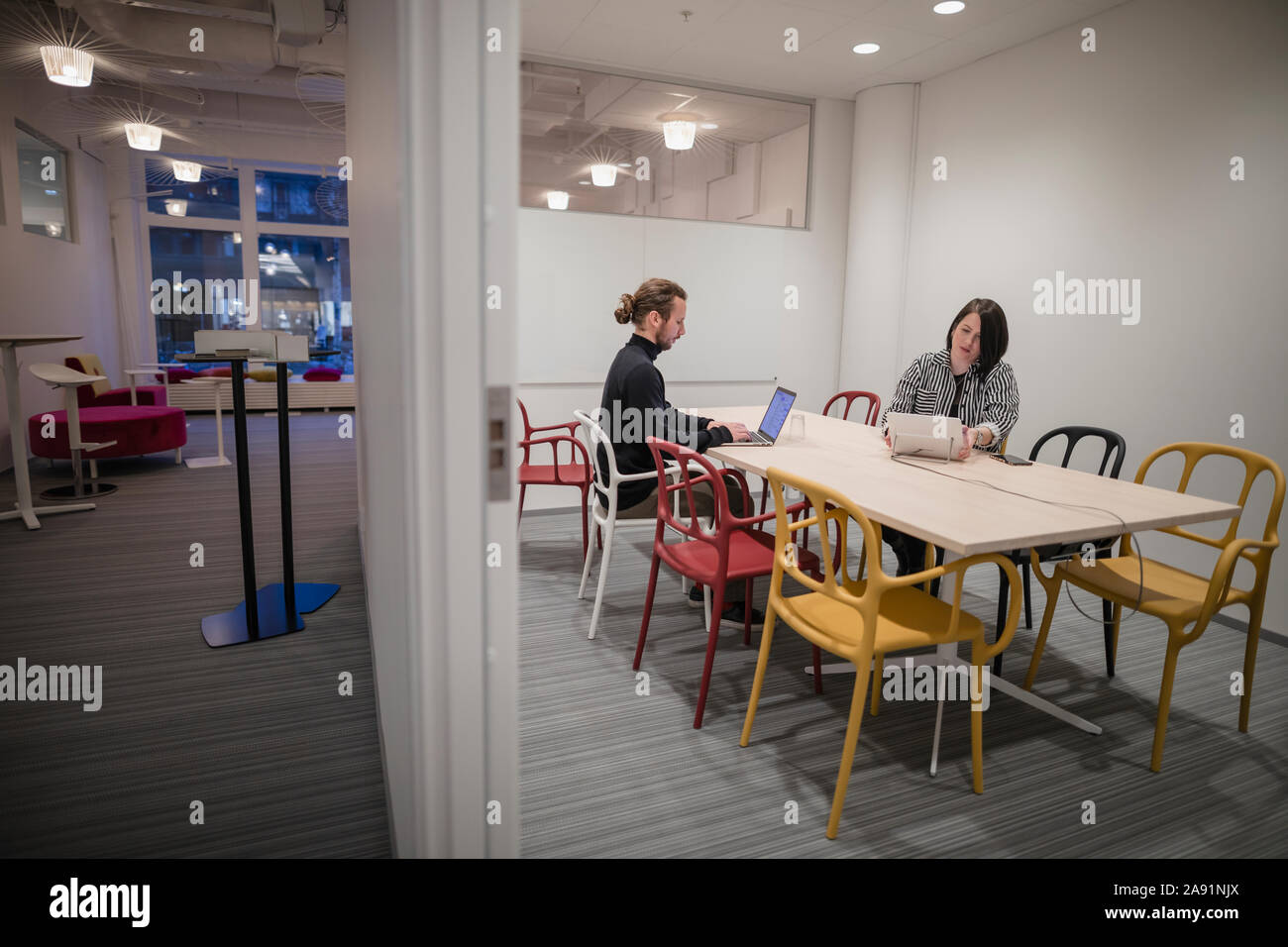 Coworkers in meeting room Stock Photo - Alamy