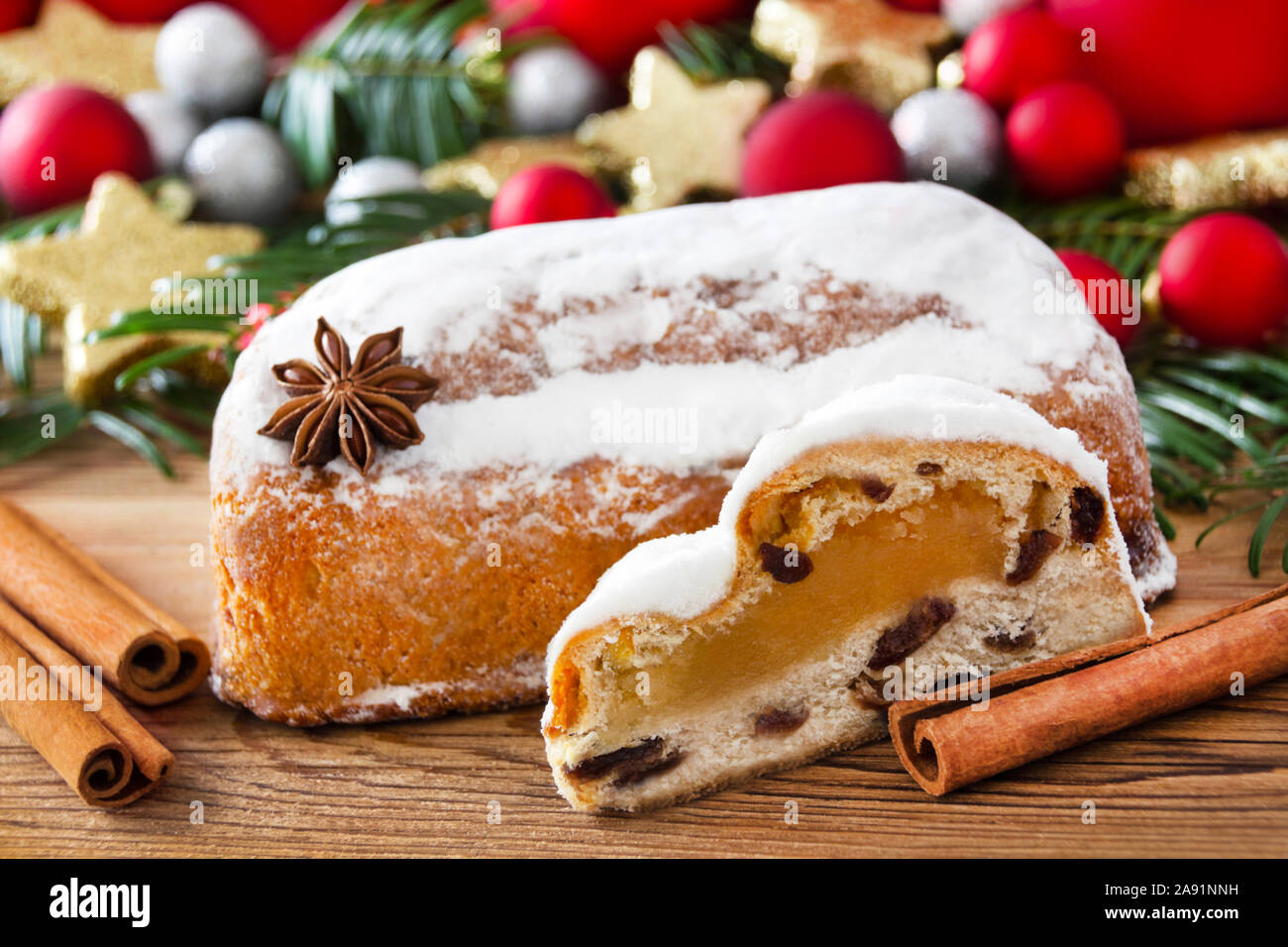 German Christstollen cake with marzipan and decorations Stock Photo - Alamy