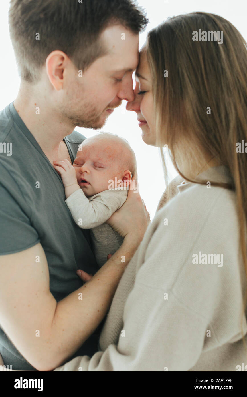Parents with baby Stock Photo - Alamy