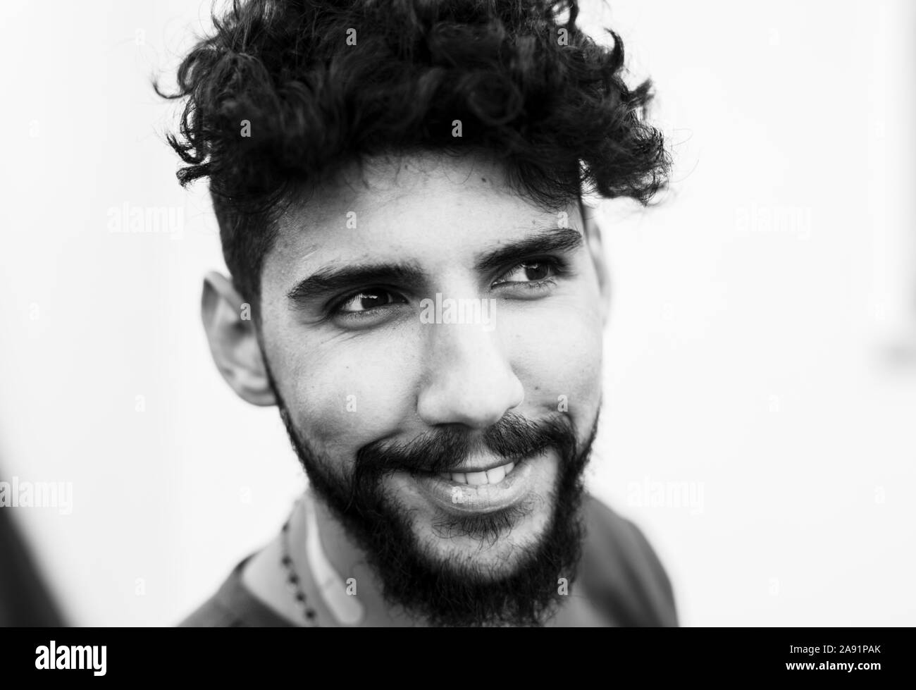 Young positive man smiling Black and White Stock Photos & Images - Alamy