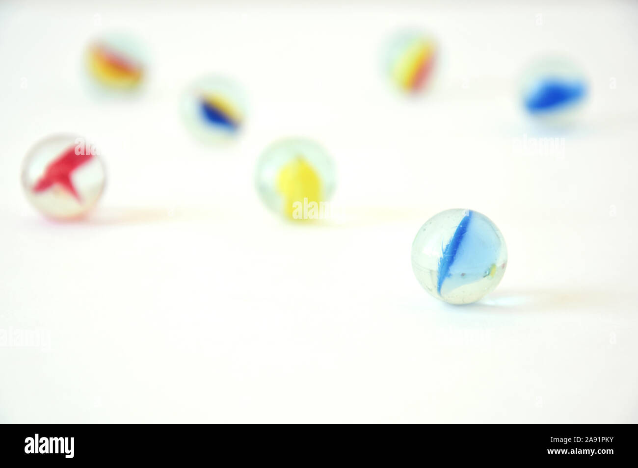 colorful glass balls in white background Stock Photo - Alamy