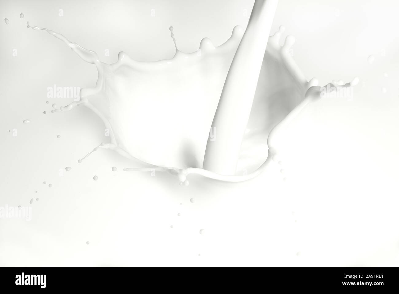 Close up of a pouring of milk with splash Stock Photo - Alamy