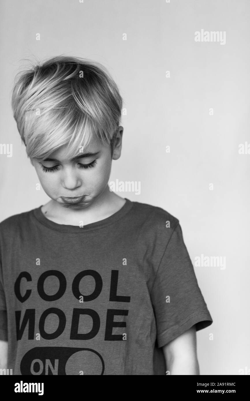 Boy making sad face Stock Photo - Alamy