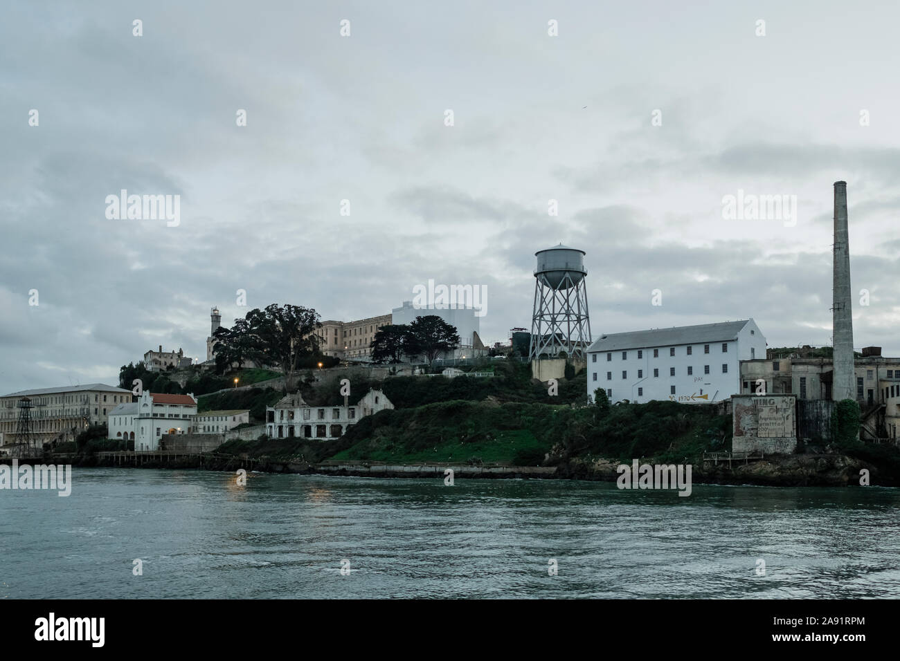 Factory buildings at water Stock Photo - Alamy