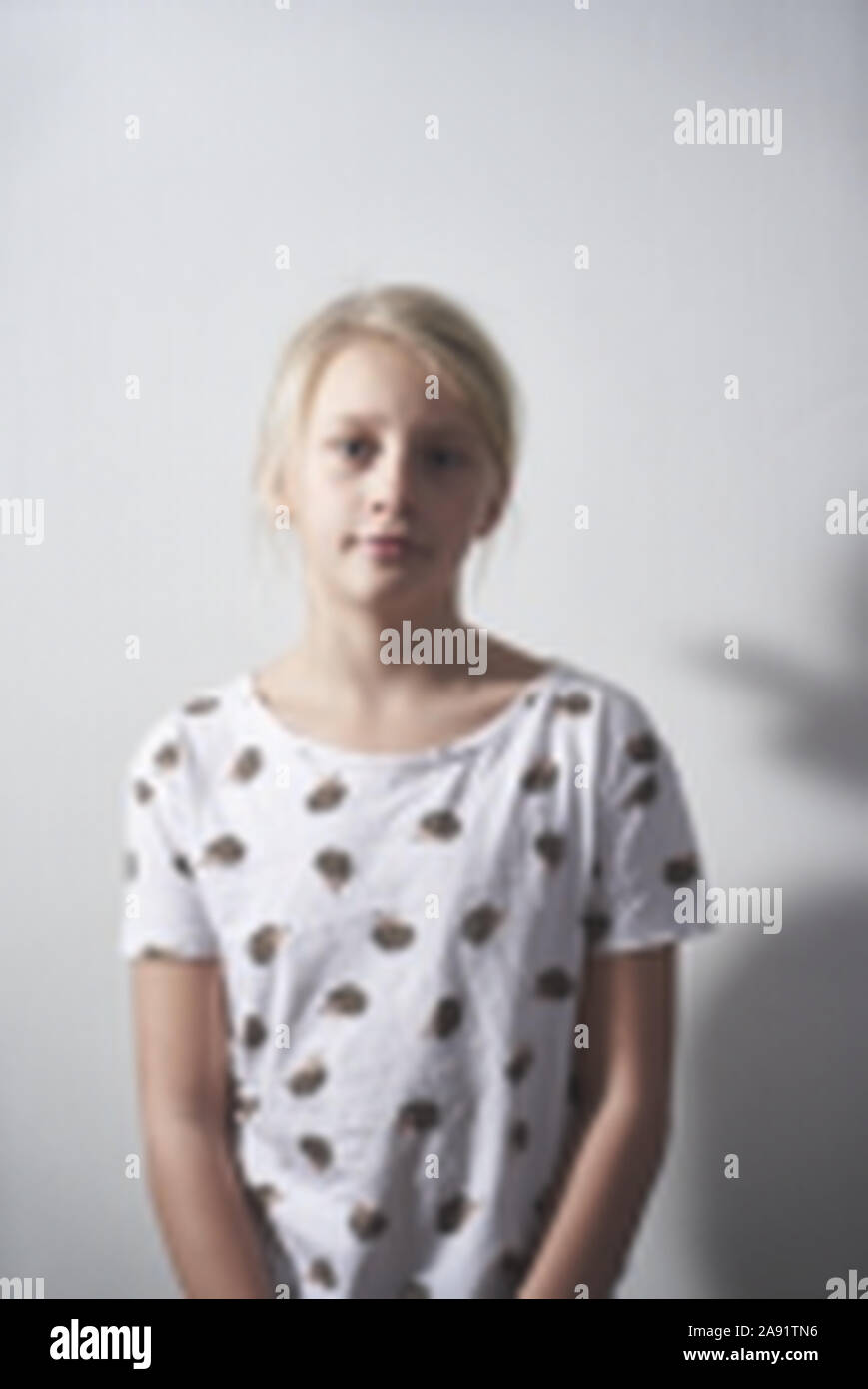 Girl looking at camera Stock Photo - Alamy