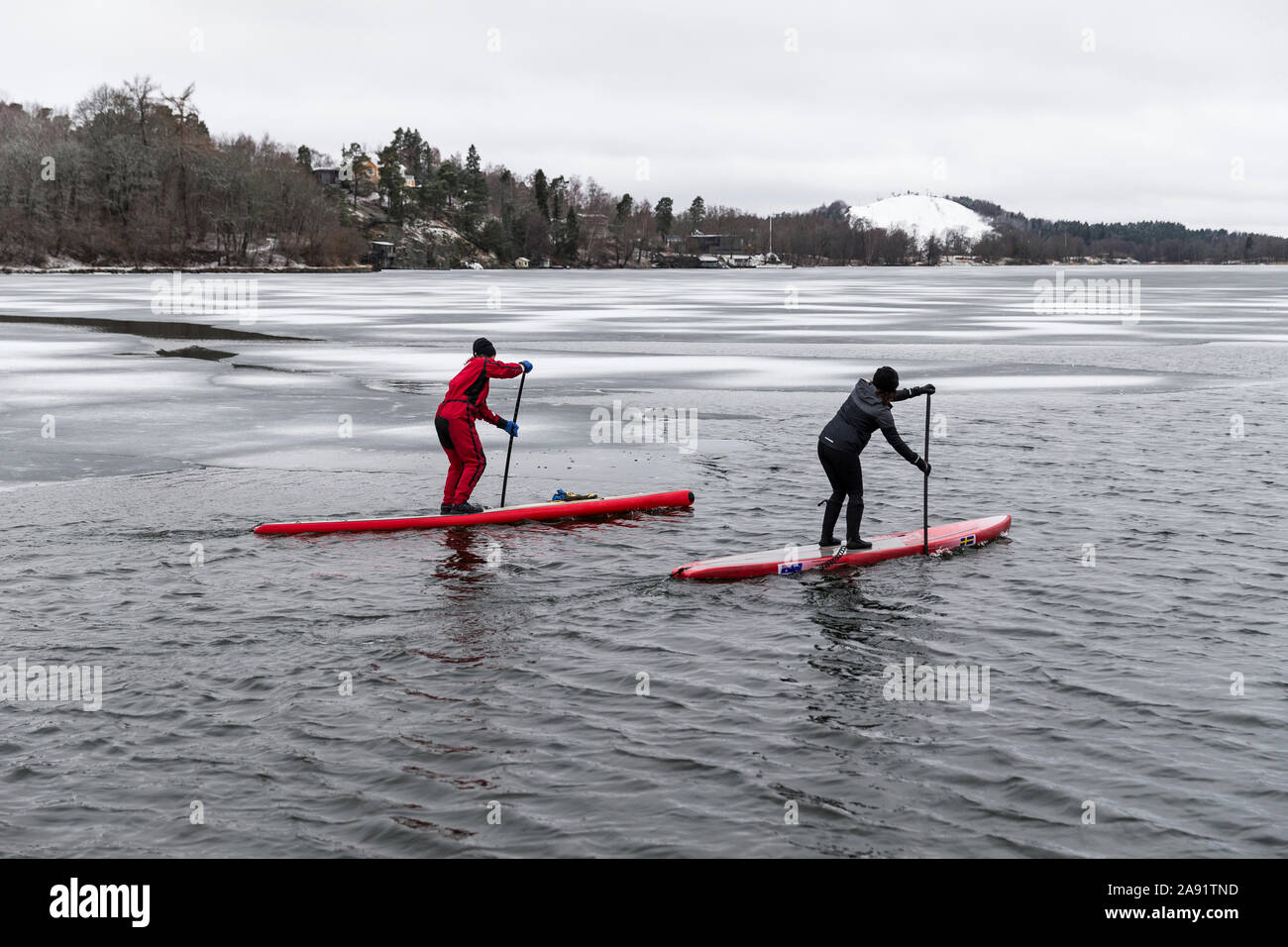 People paddle boarding Stock Photo - Alamy