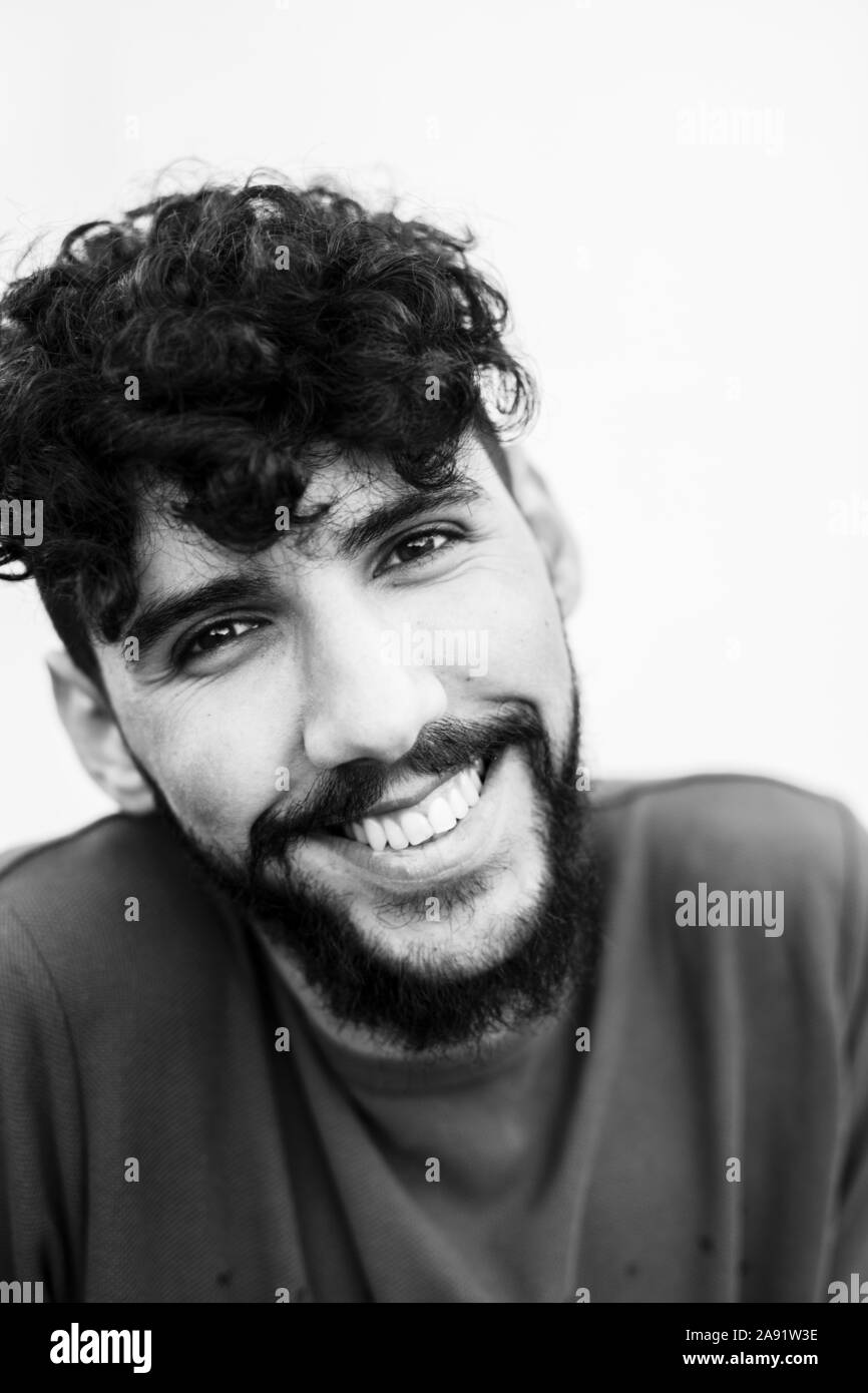 Smiling curly young black Black and White Stock Photos & Images - Alamy