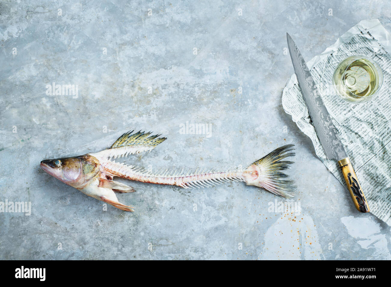 Knife and fishbones Stock Photo - Alamy