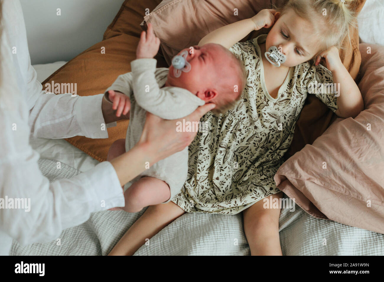 Two mother baby crying hi-res stock photography and images - Alamy