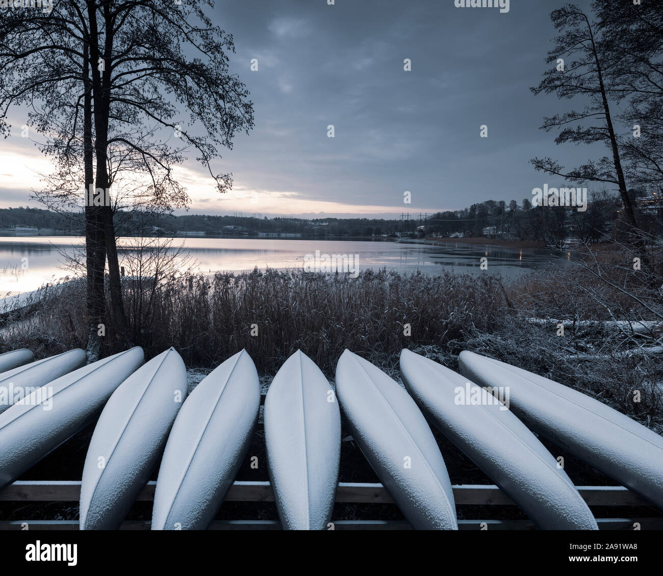 Kayaks at lake Stock Photo - Alamy