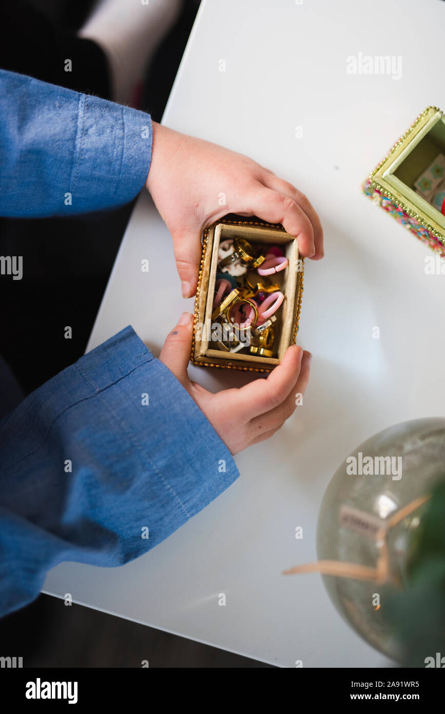 Childs hands holding jewelry box Stock Photo - Alamy