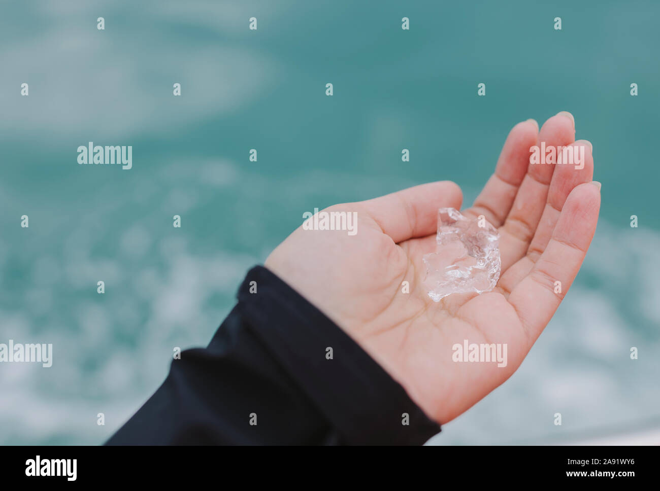 Ice on hand Stock Photo - Alamy