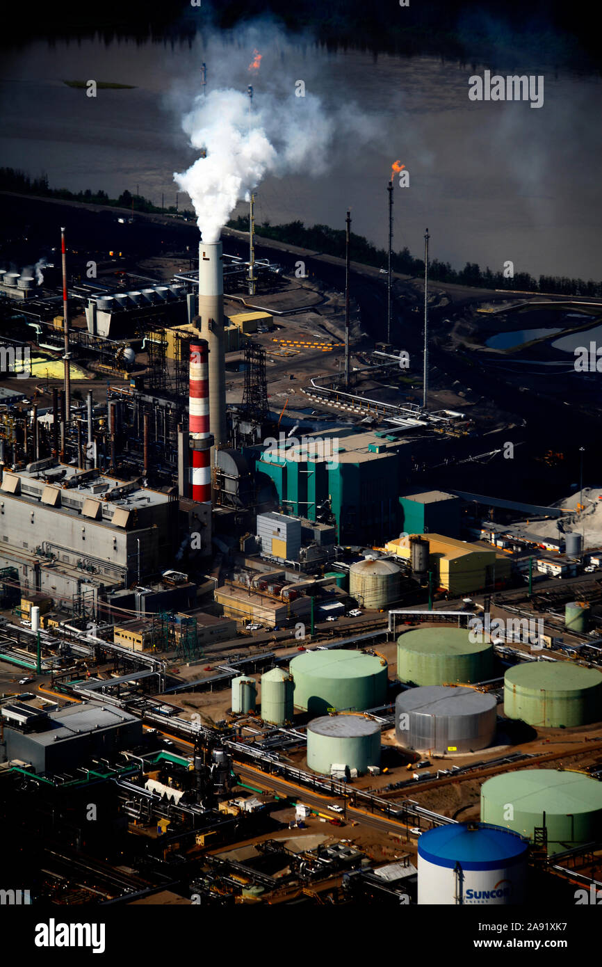 The Suncore and Syncrude open pit oil excavation sites in Fort McMurray ...