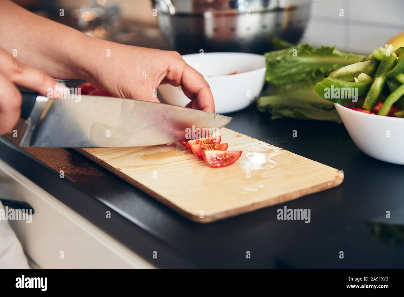 Woman preparing healthy food in kitchen Stock Photo - Alamy